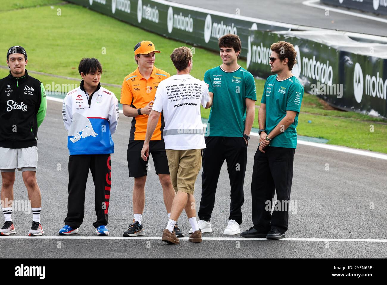 All drivers paying tribute to Ayrton Senna, with Sebastian Vettel ...