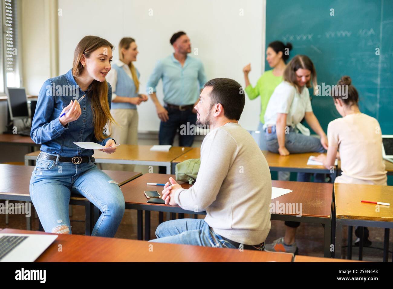 Positive students communicating during recess between lectures in ...