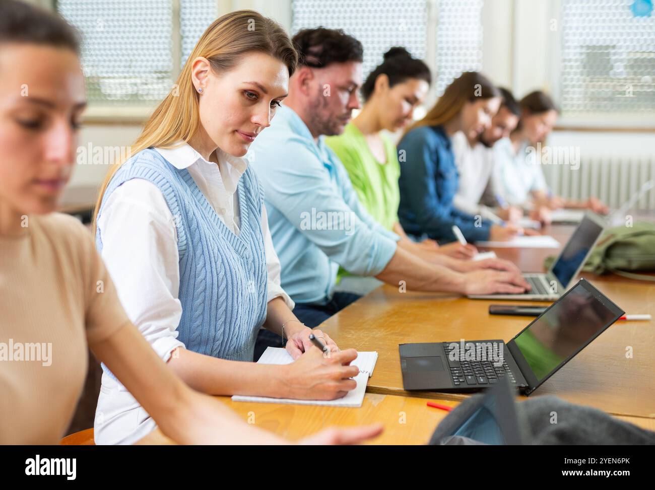 Portrait of a girl student studying during and writing a synopsis Stock ...