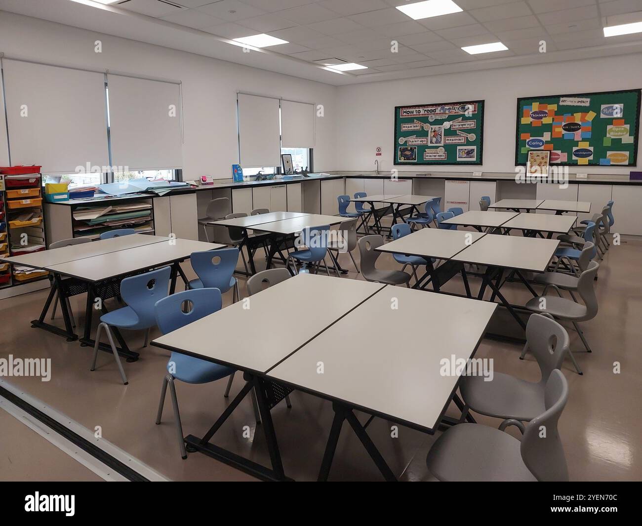 Empty classroom with chairs and tables in campus. Daycare center ...