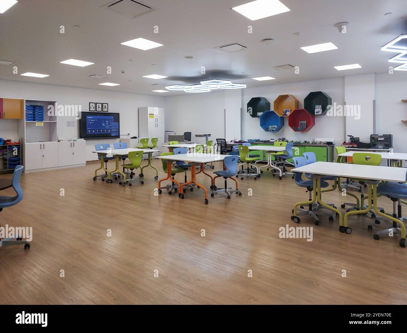 Empty classroom with chairs and tables in campus. Daycare center ...