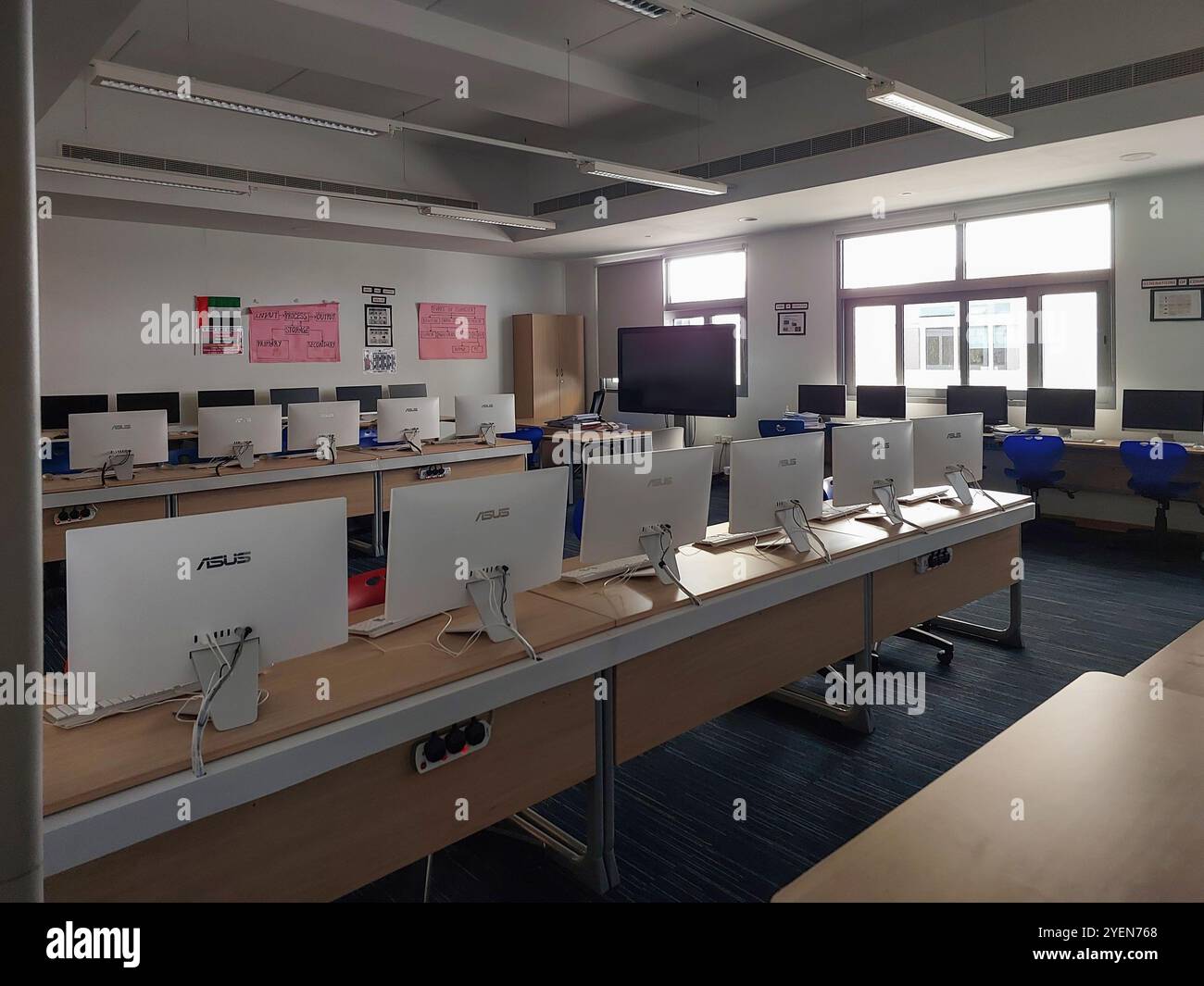 Empty classroom with chairs and tables in campus. Daycare center ...