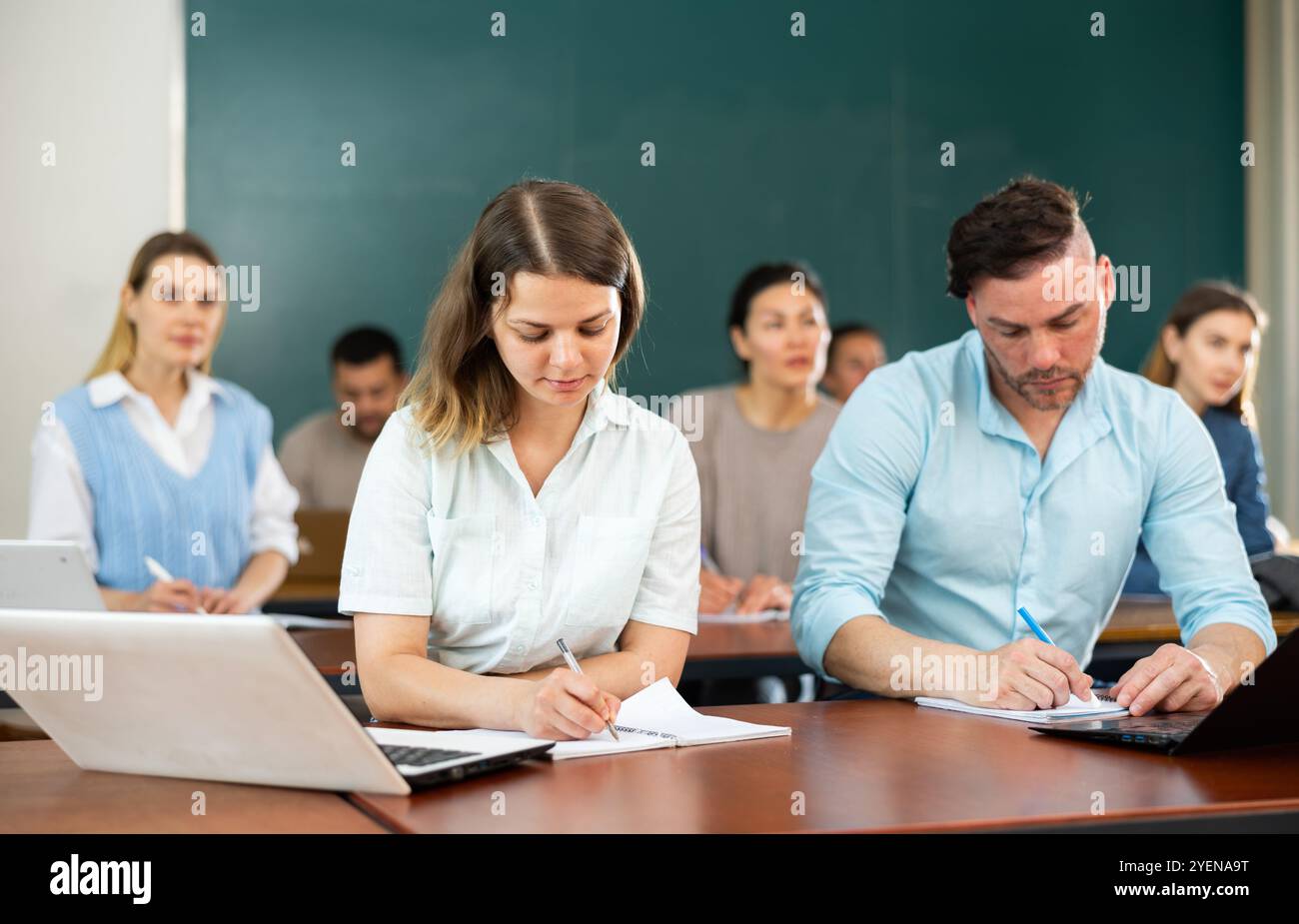 Concentrated students studying in the university auditorium Stock Photo ...