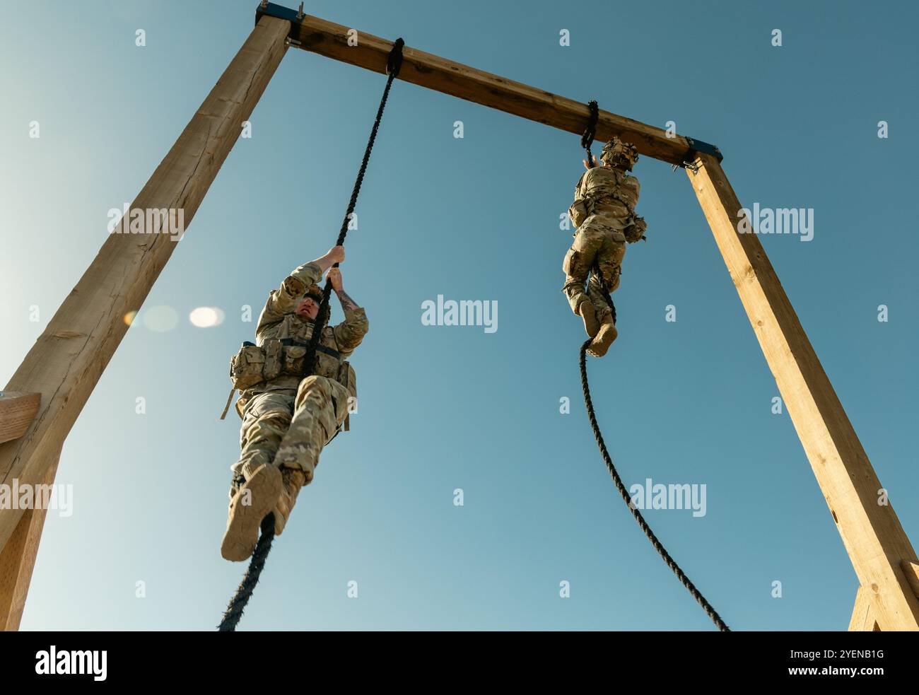 Ivy Soldiers from the 4th Infantry Division climb a rope tower during ...