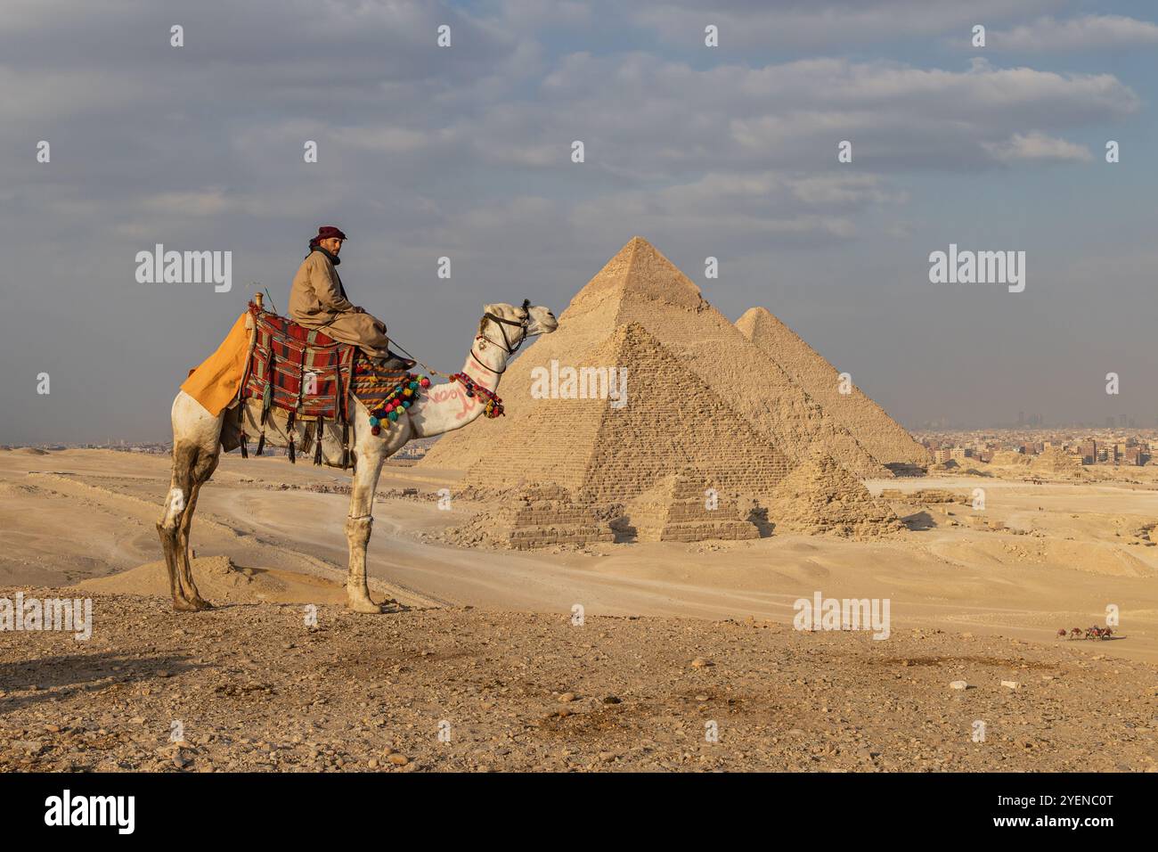 Giza Pyramid Complex, Al Ahram, Giza, Egypt. February 21, 2023. Man on ...