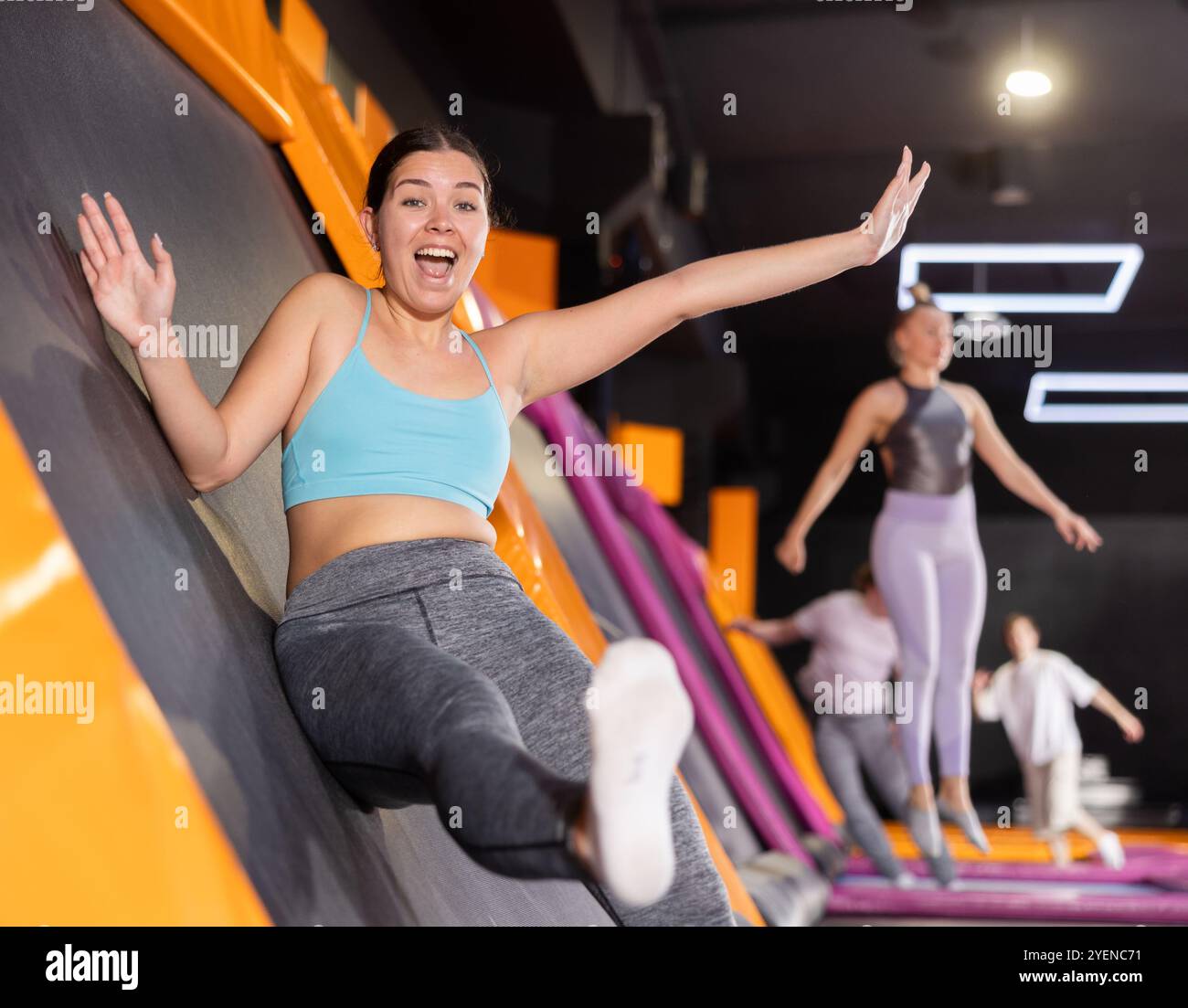 Adult sportsman jumping on trampoline hi-res stock photography and ...