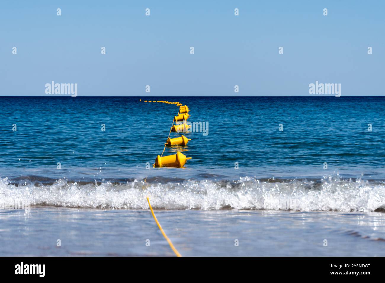floating buoys in ocean beach Stock Photo - Alamy
