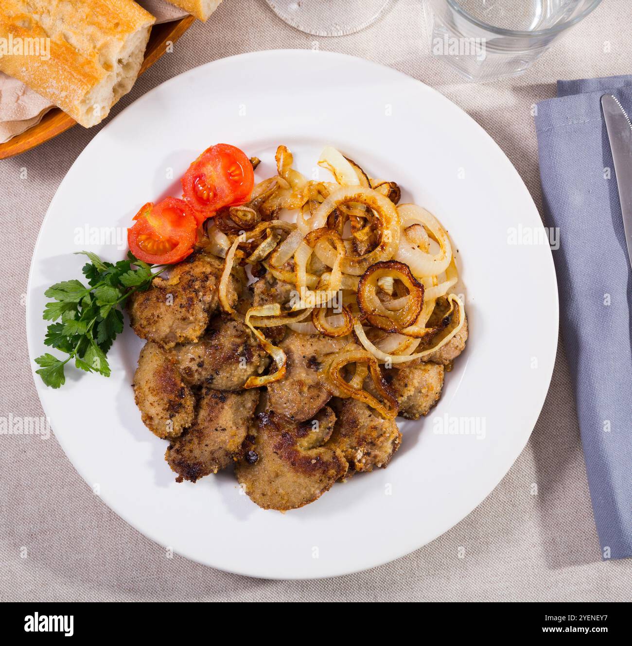 Fried rabbit liver with onion Stock Photo - Alamy