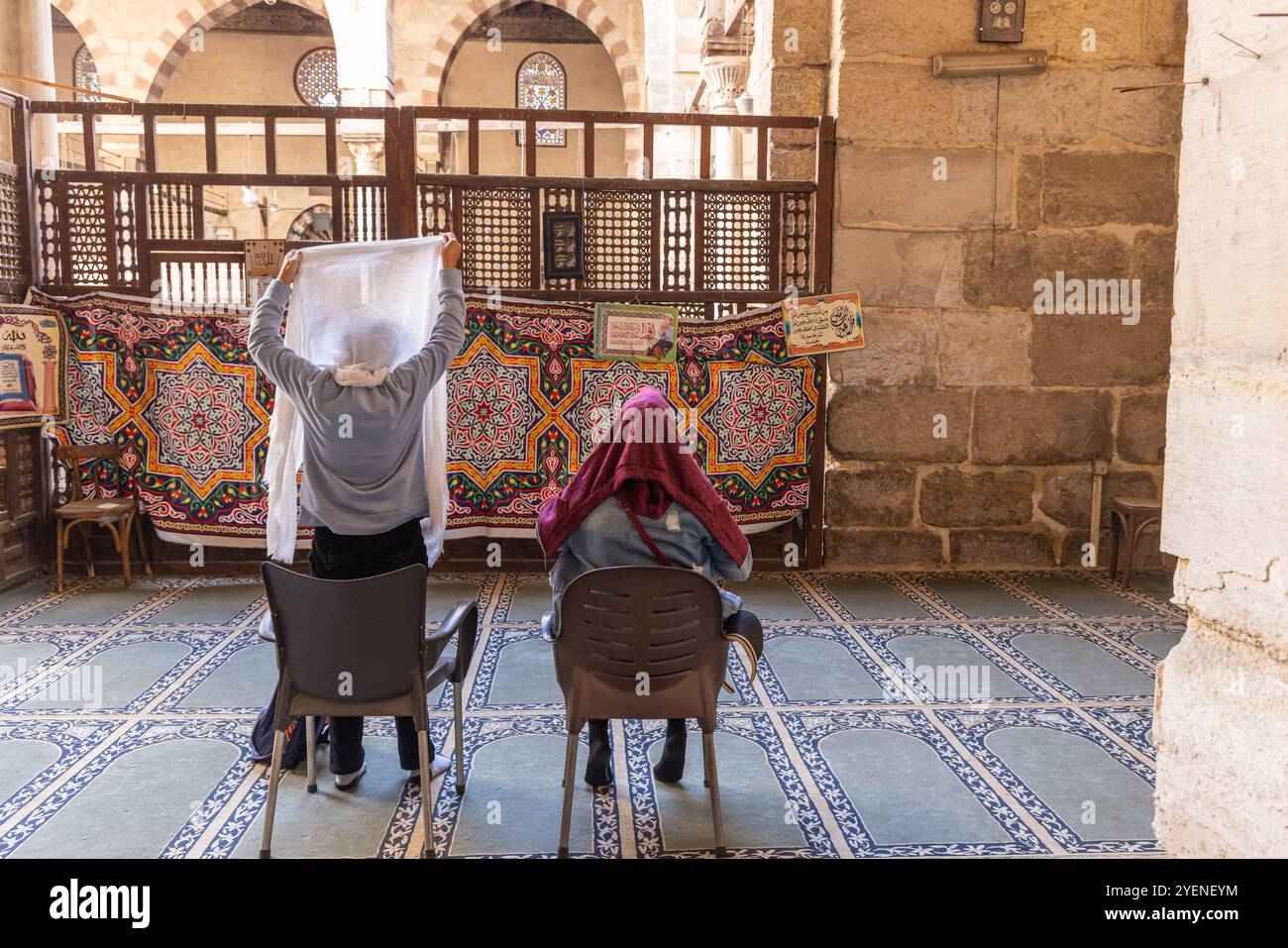Al-Darb Al-Ahmar, Old Cairo, Cairo, Egypt. February 26, 2024. Women ...