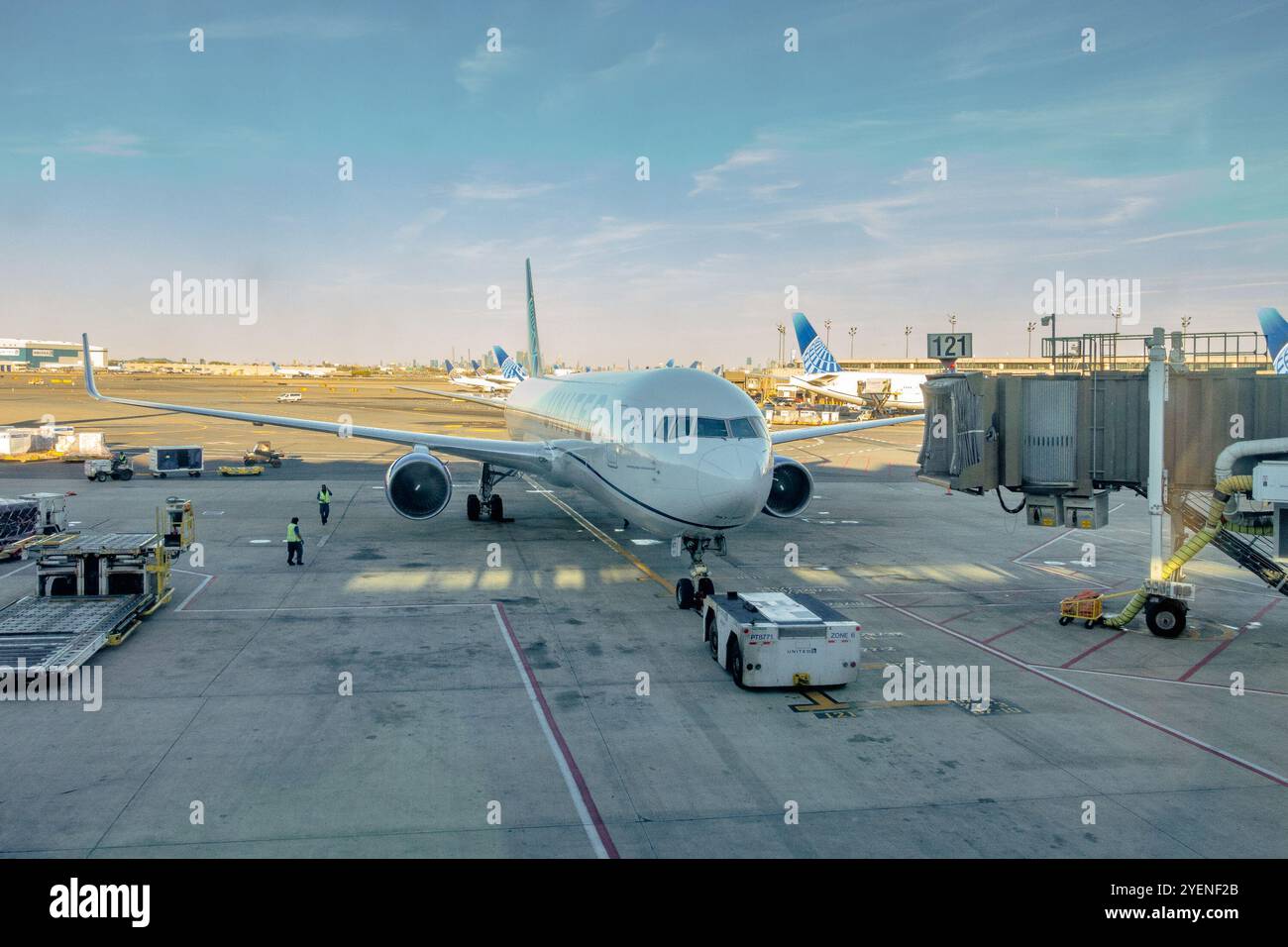 Newark, NJ – US – Oct 12, 2024 the ground crew work at preparing United ...
