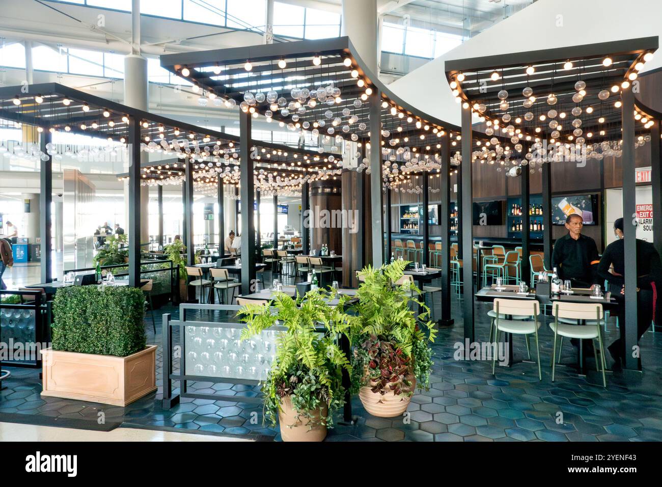 Newark, NJ – US – Oct 12, 2024 An airport restaurant’s dining room at ...