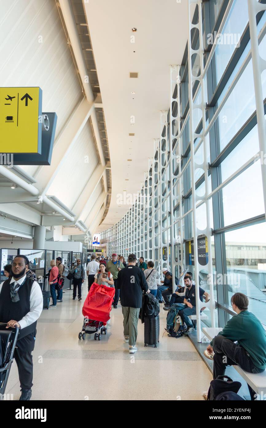 Newark, NJ – US – Oct 12, 2024 View of travelers walking through the ...