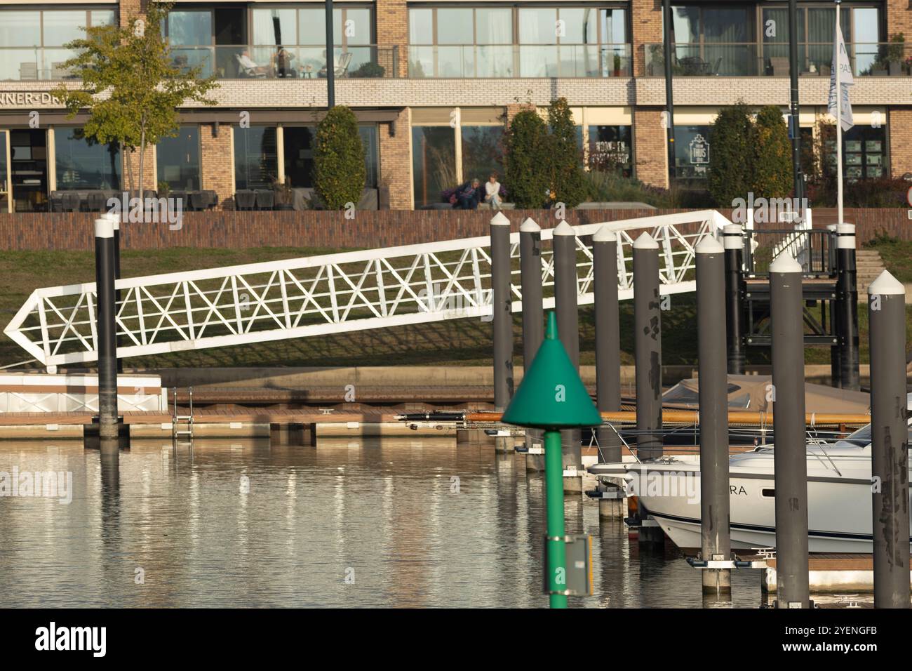 Ramp in pleasure boat harbor along river IJssel with reflection of ...