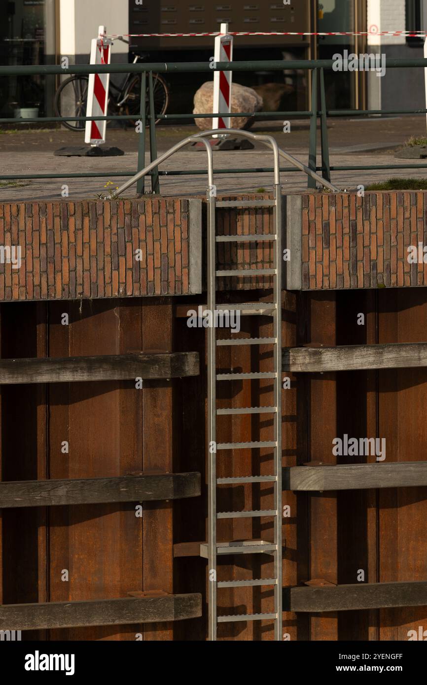 Vertical stairs of quay in pleasure boat harbour port along river ...