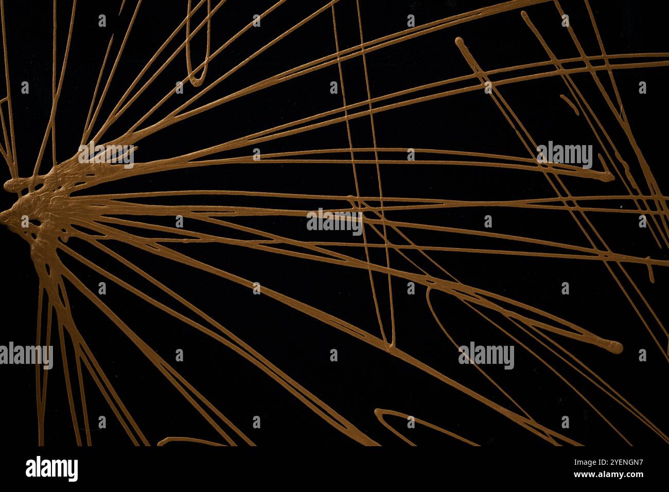 Abstract Gold Paint Splatter on Black Background Stock Photo - Alamy