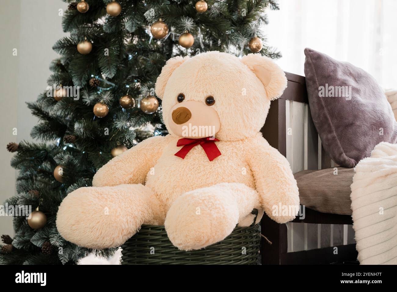 Cozy Christmas Scene Featuring a Large Plush Teddy Bear and Holiday ...