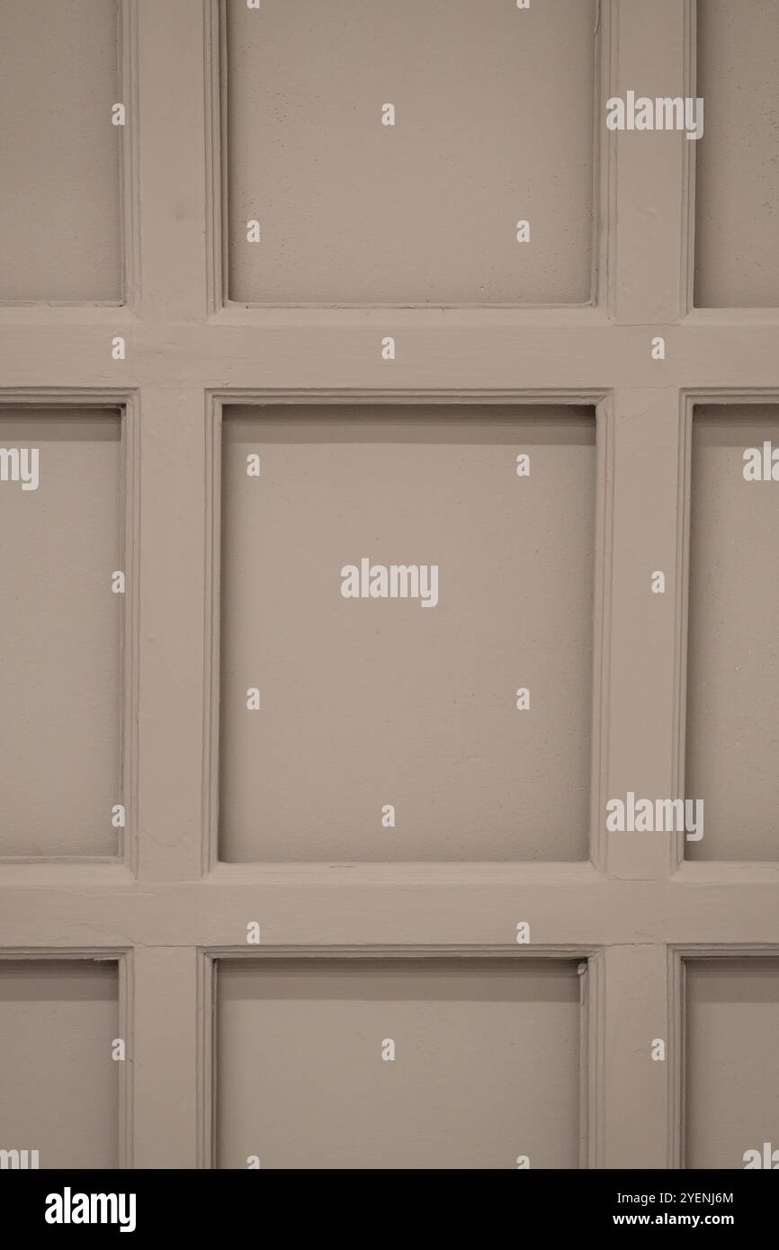 Intricately Paneled Neutral Colored Wall with Symmetrical Grid Design ...