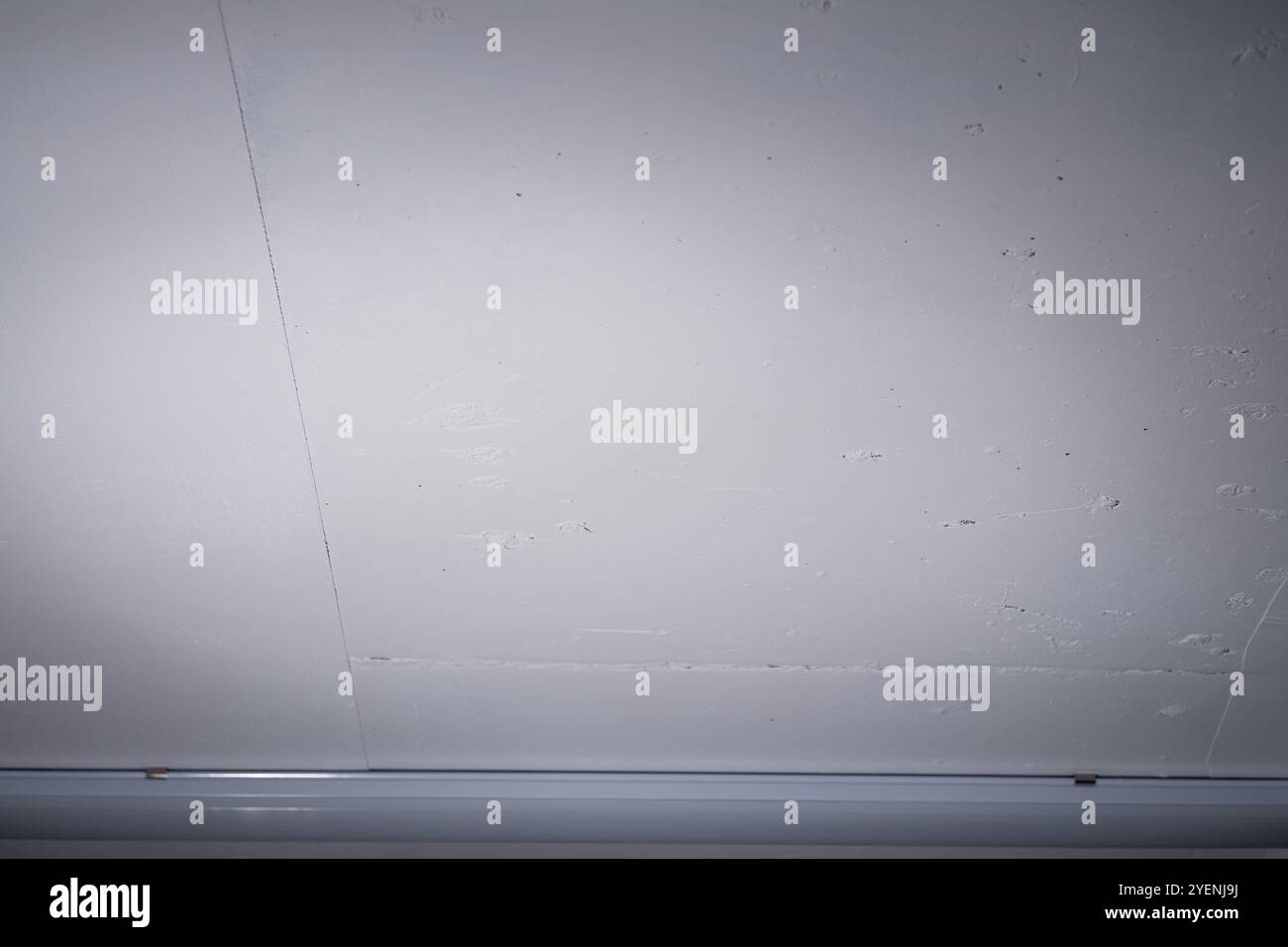 A Minimalist Perspective of a Textured White Ceiling Stock Photo - Alamy
