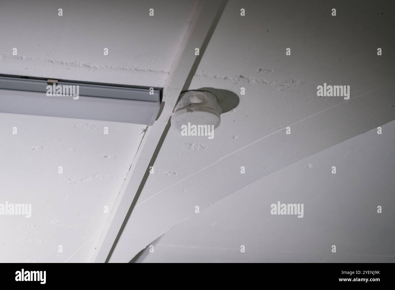 Ceiling Perspective of a Minimalist Light Fixture in an Industrial ...