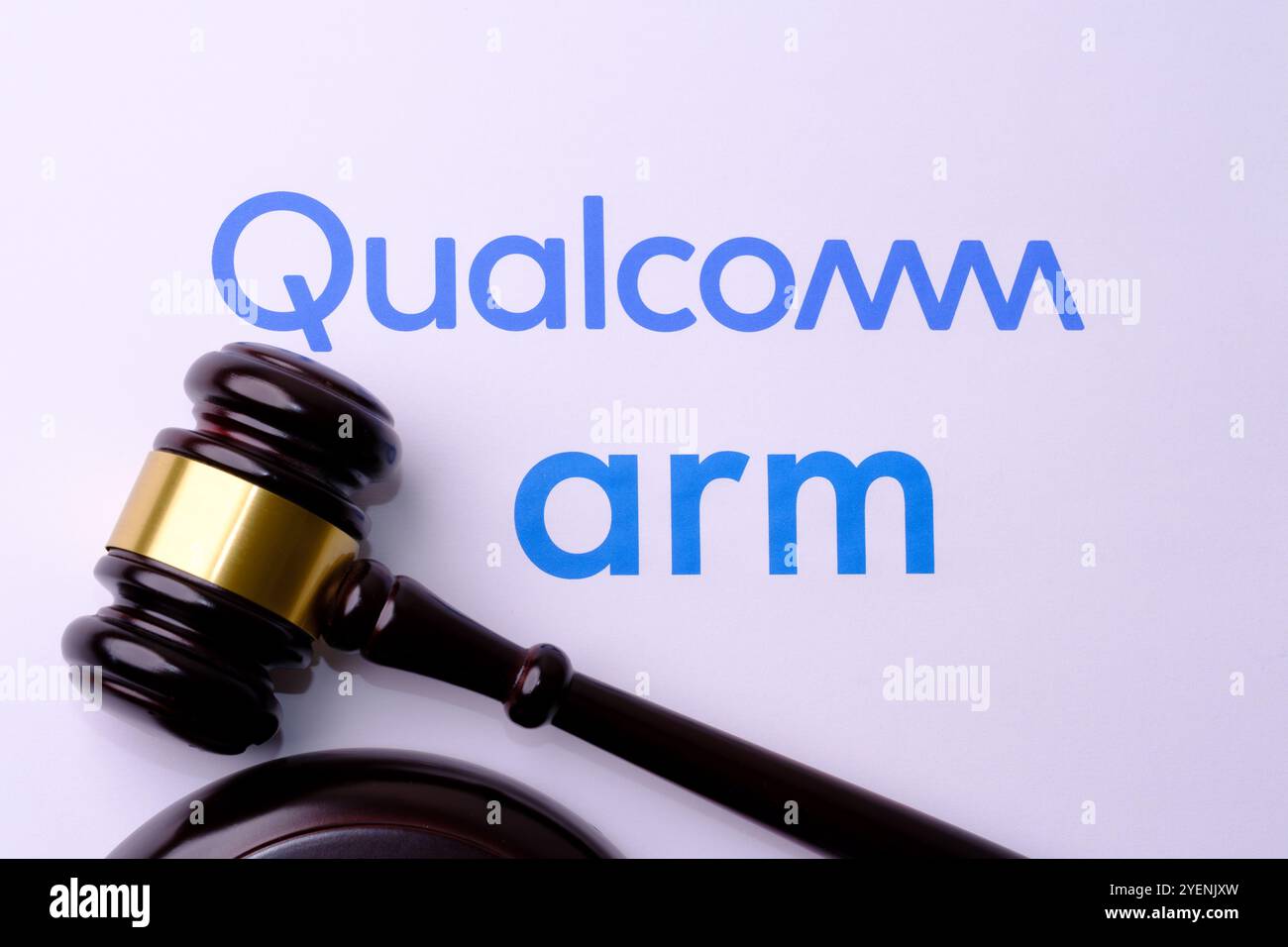 Qualcomm and Arm logos with judge's gavel, symbolizing ongoing legal ...