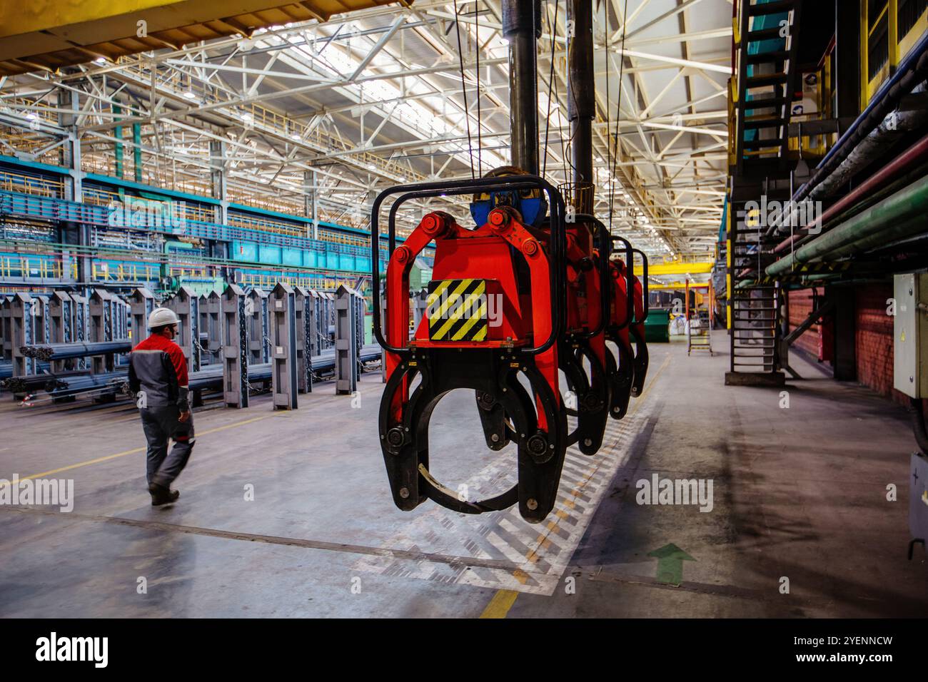 Working overhead crane in metalworking factory Stock Photo - Alamy