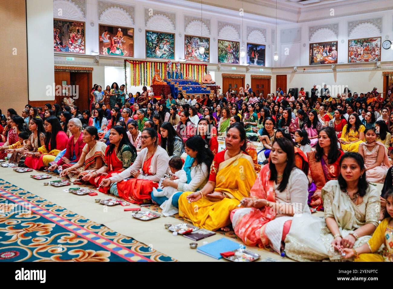 London, UK. 31th Oct 2024. Devotees at the ceremony of Sharda Pujan ...