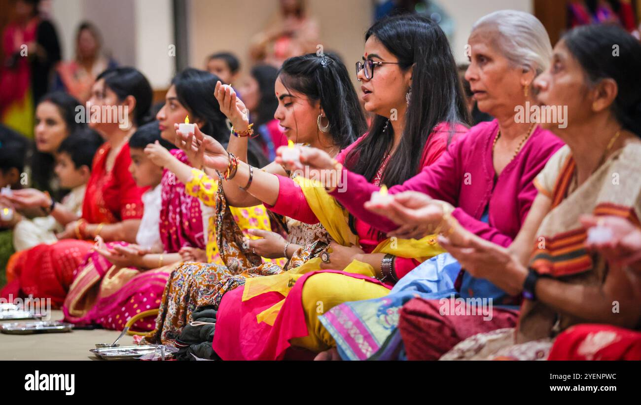 London, UK. 31th Oct 2024. Devotees at the ceremony of Sharda Pujan ...