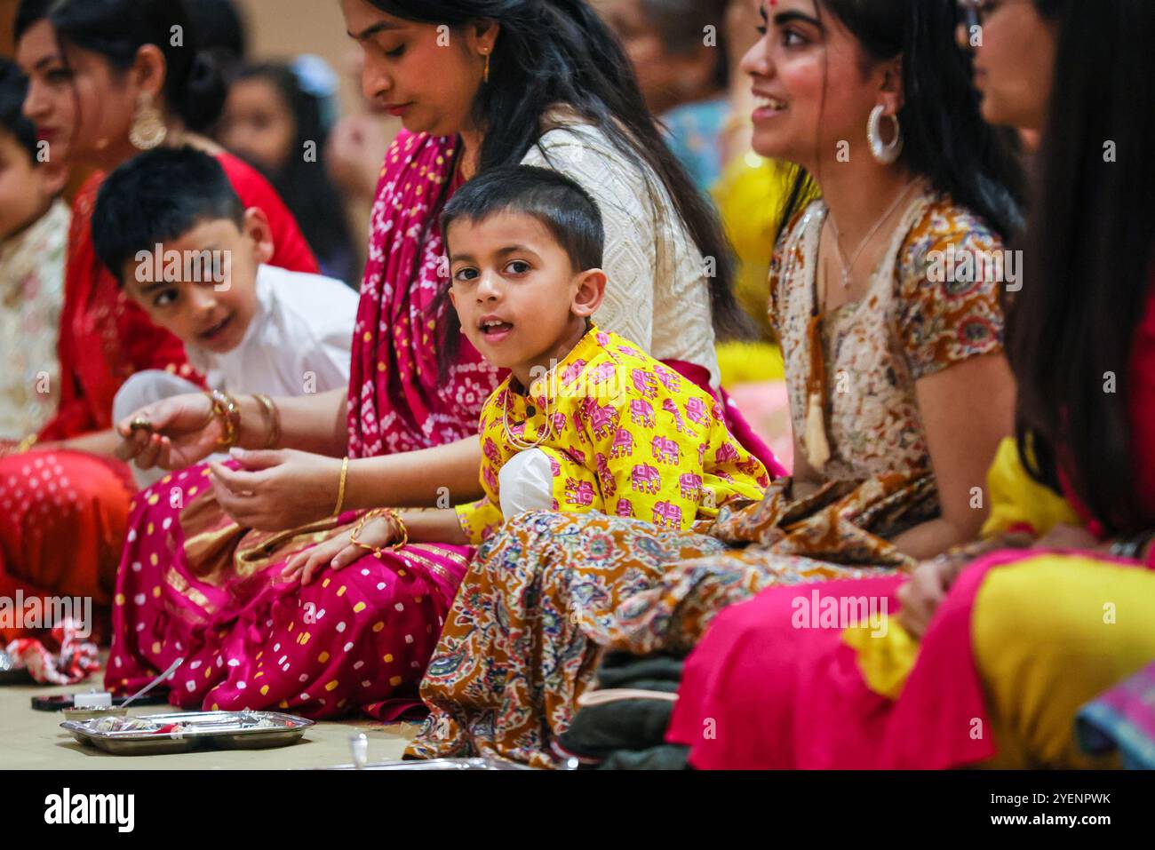 London, UK. 31th Oct 2024. Devotees at the ceremony of Sharda Pujan ...