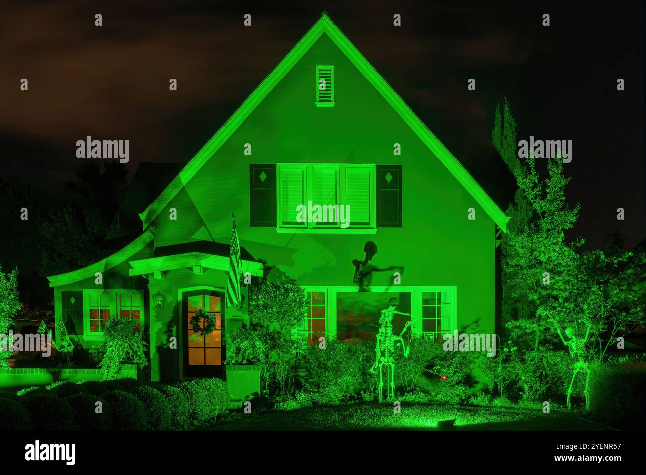 Halloween Themed Haunted House in Green Glow with Skeletons and Ominous ...