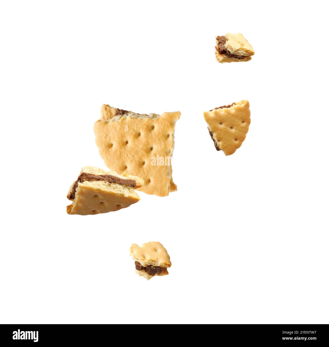 Tasty broken sandwich cookie in air on white background Stock Photo - Alamy