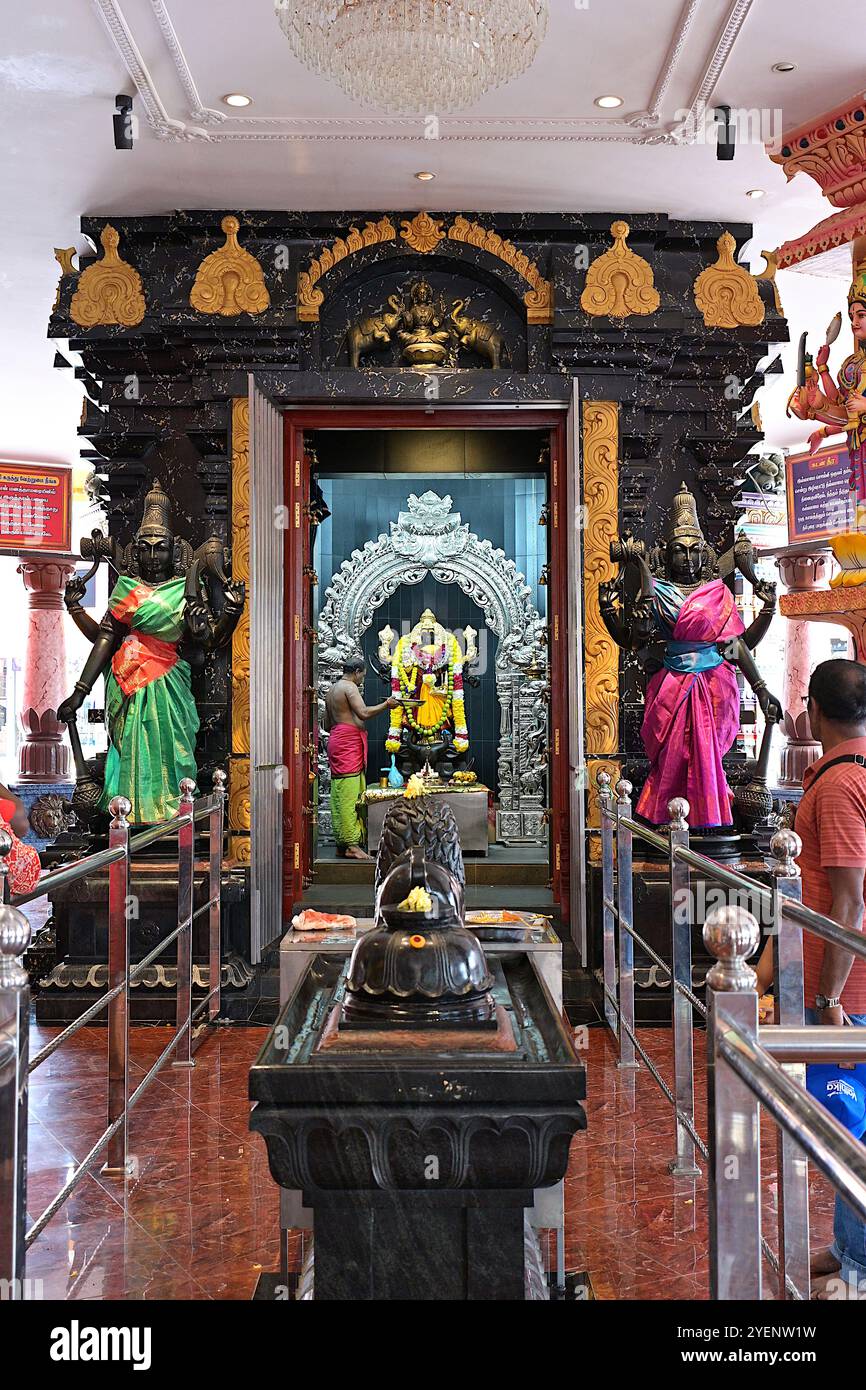 Shrine to Durga shown in a triumphant pose as the slayer of the buffalo ...
