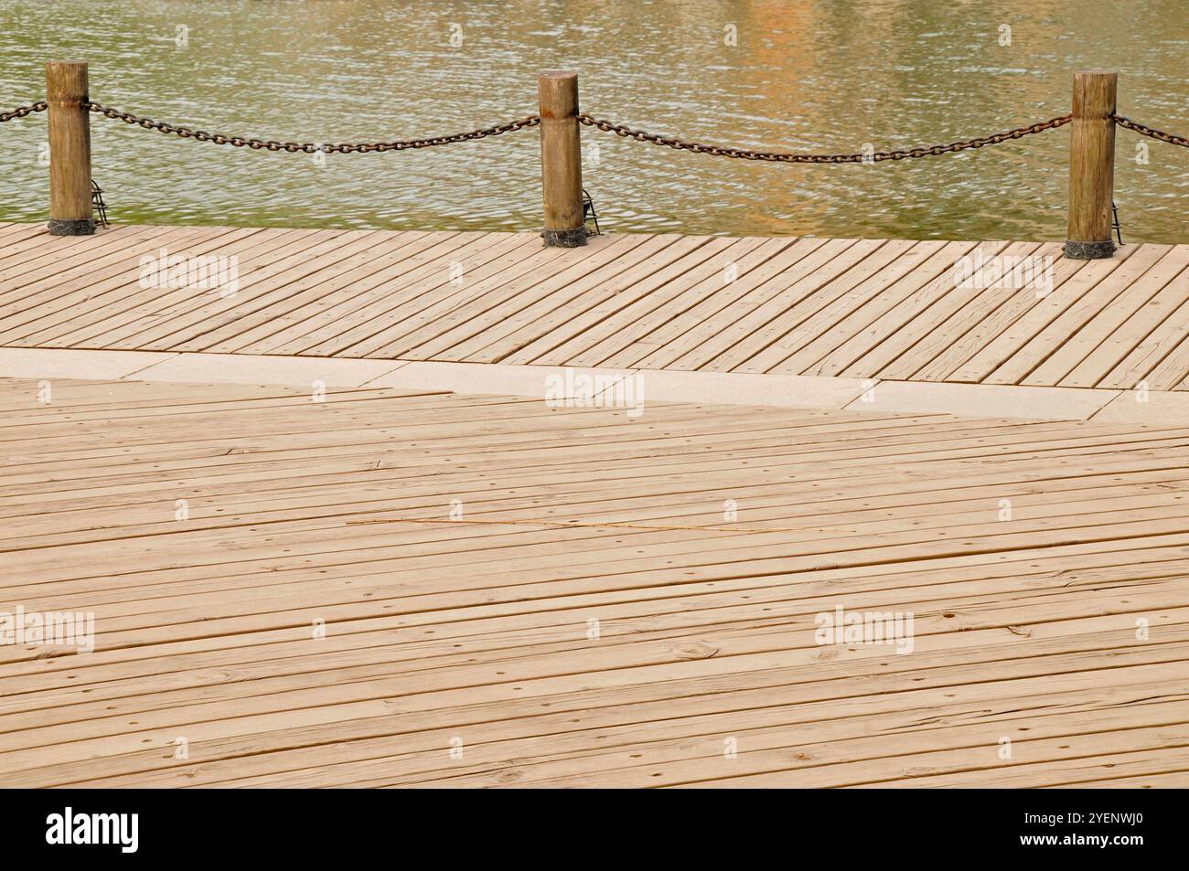 Wharf on piles and the chains Stock Photo - Alamy