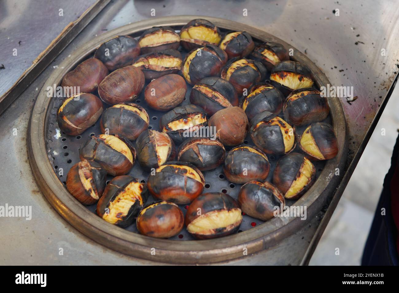 traditional Istanbul street food grilled chestnuts in a row Stock Photo ...