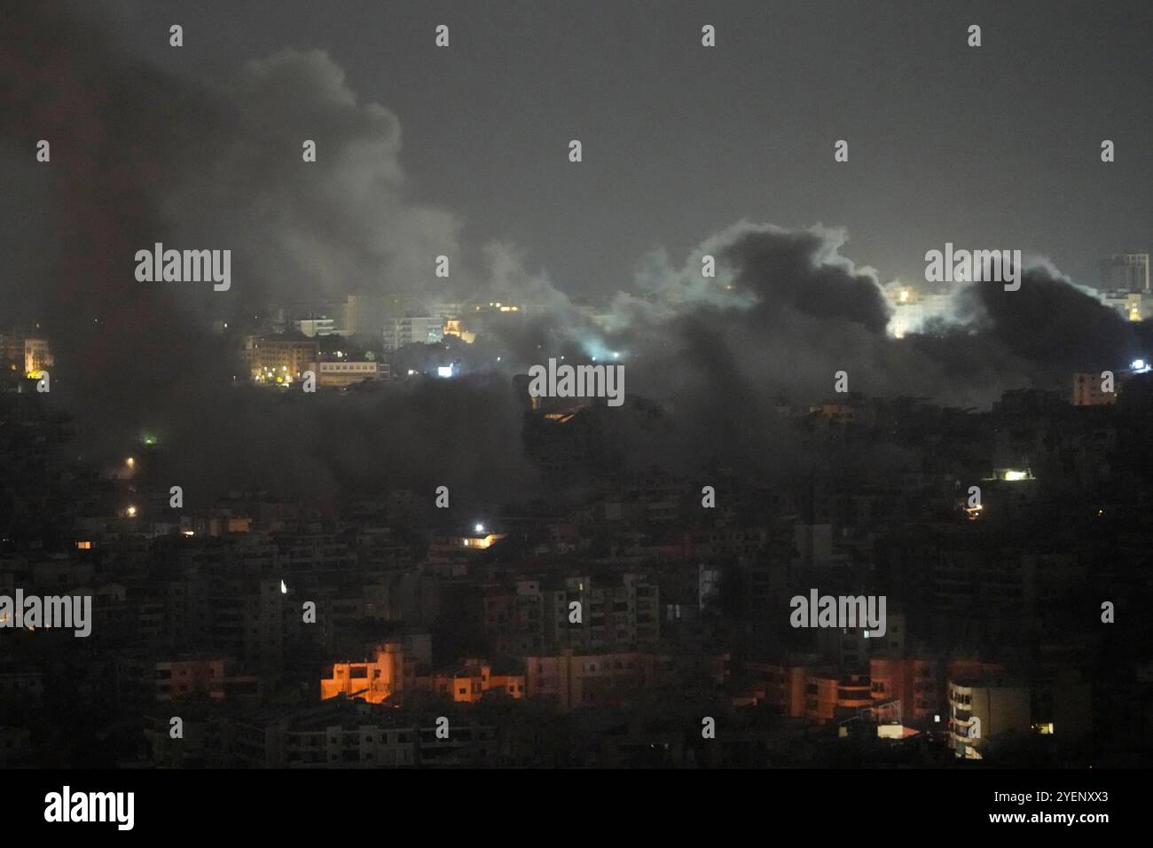 Smoke rises from Israeli airstrikes on Dahiyeh, in the southern suburb ...