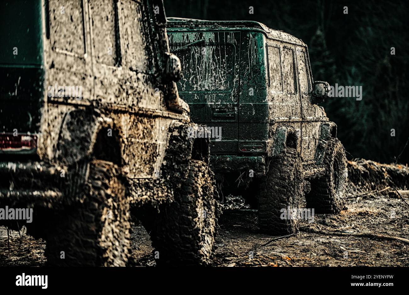 Bottom view to big offroad car wheel on country road and mountains ...