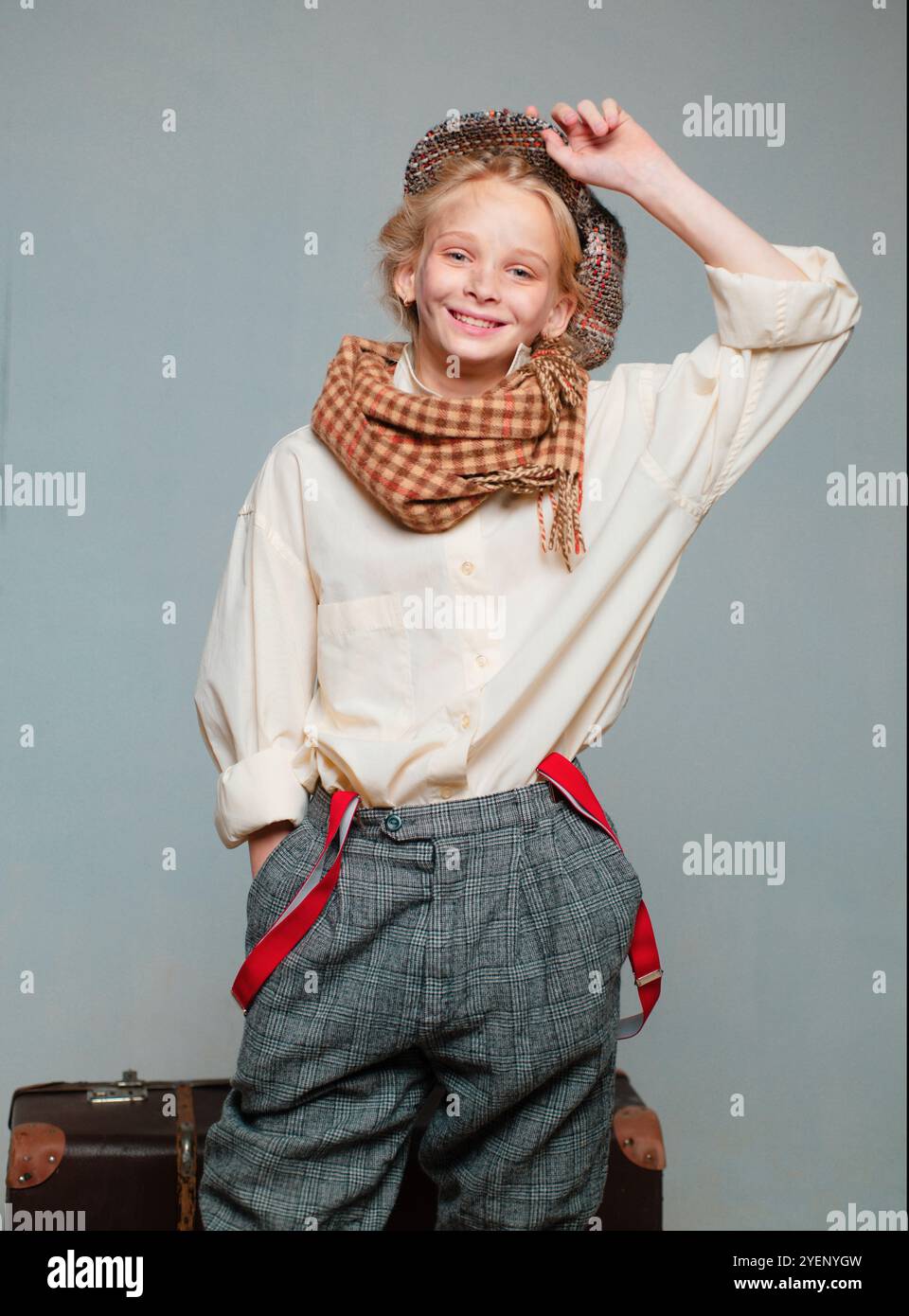 adventure. teen girl in retro male suit. street kid with dirty face ...