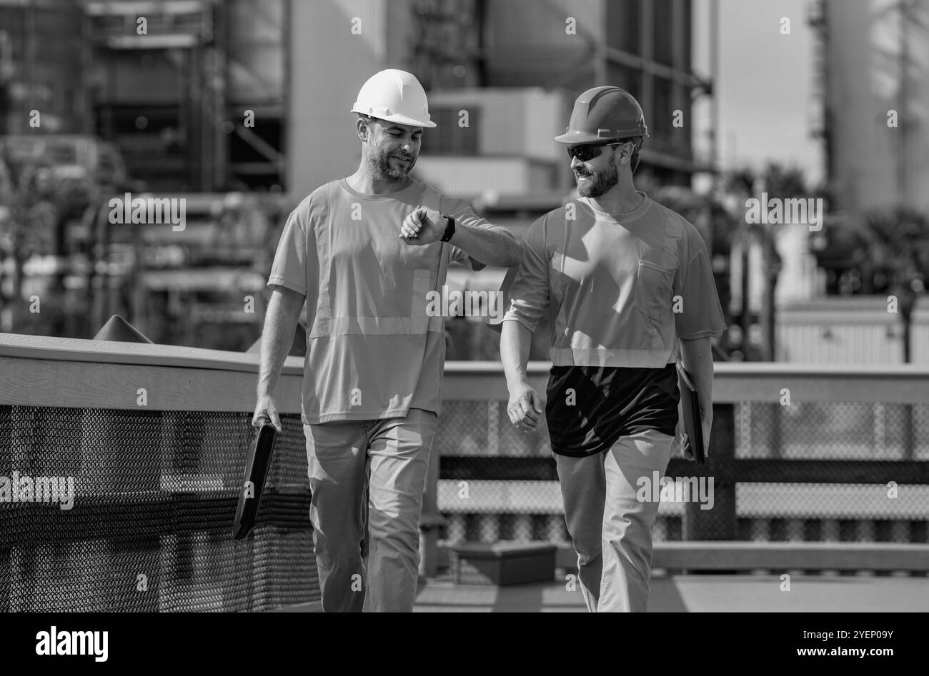Engineers walk in factory facility hi-res stock photography and images - Alamy