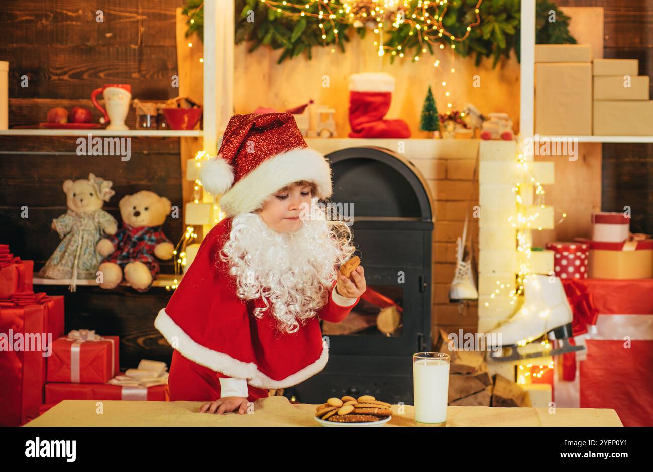Happy Santa Claus - cute boy child eating a cookie and drinking glass ...