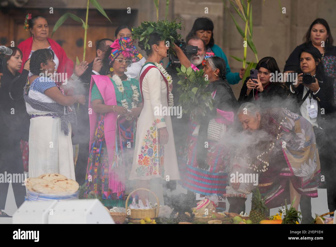 Indigenous women carry out a traditional ceremony for President Claudia ...