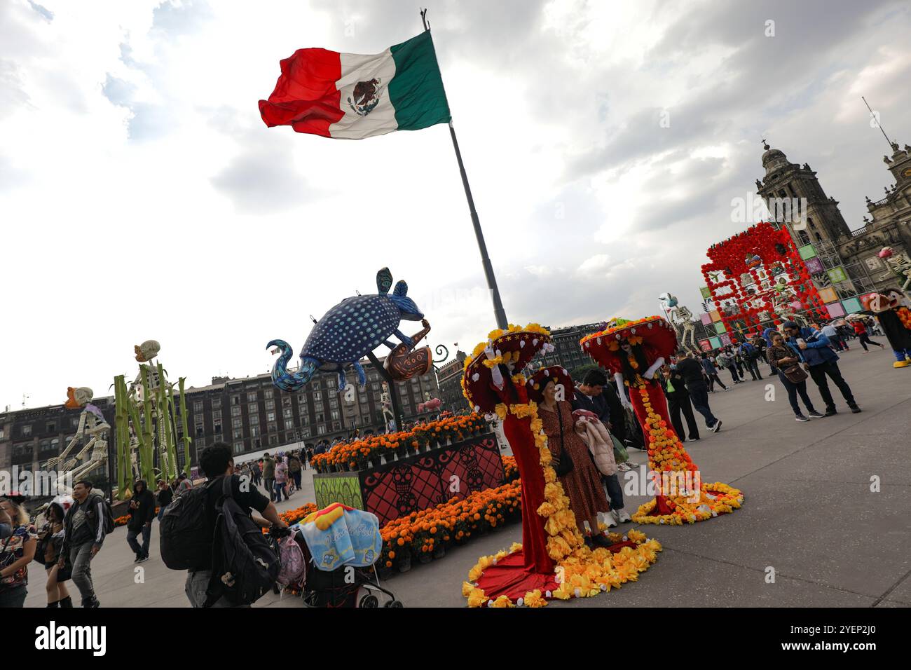 Tourists attending the main square Zocalo to enjoy the Mega Ofrenda ...
