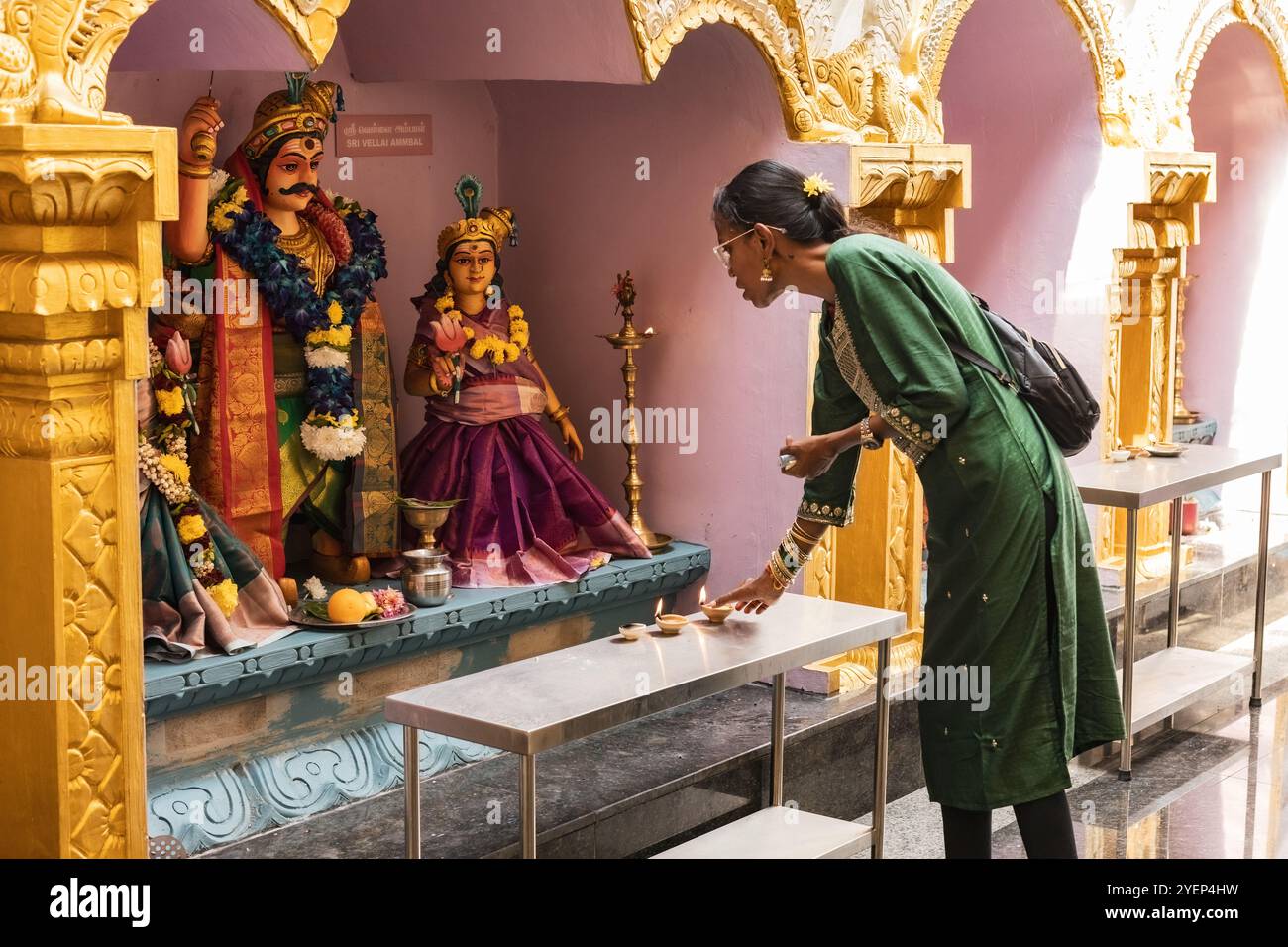 Hindu people praying in the temple for Diwali celebration in Kuala ...