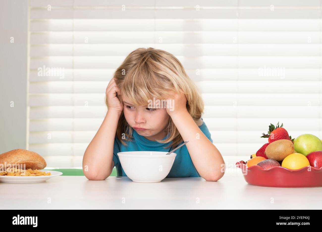 Portrait of kid with no appetite. Concept of loss of appetite. Kid ...