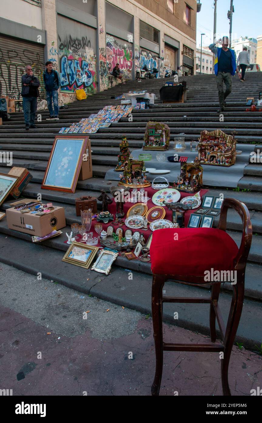 Flea market on the stairs of the central post office building in Naples ...