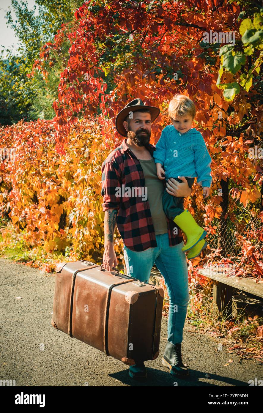 Bearded dad telling son about travelling. Traveler with lot experience ...