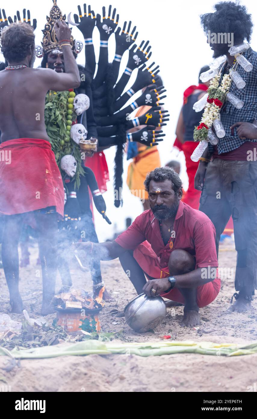 Kulasai Dasara, Portrait of indian hindu devotee with painted face and ...