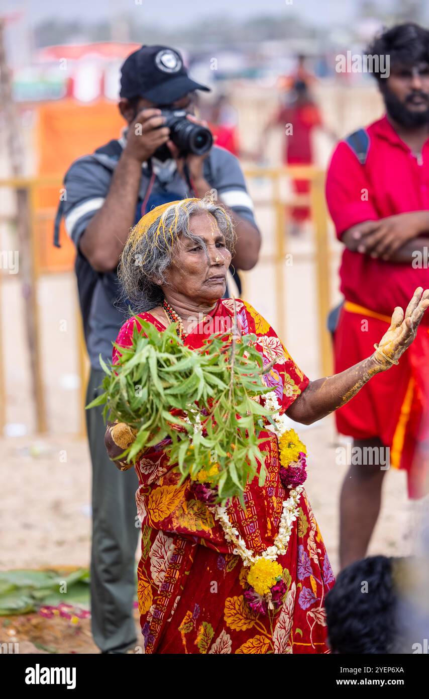 Kulasai Dasara, Portrait of indian hindu devotee with painted face and ...