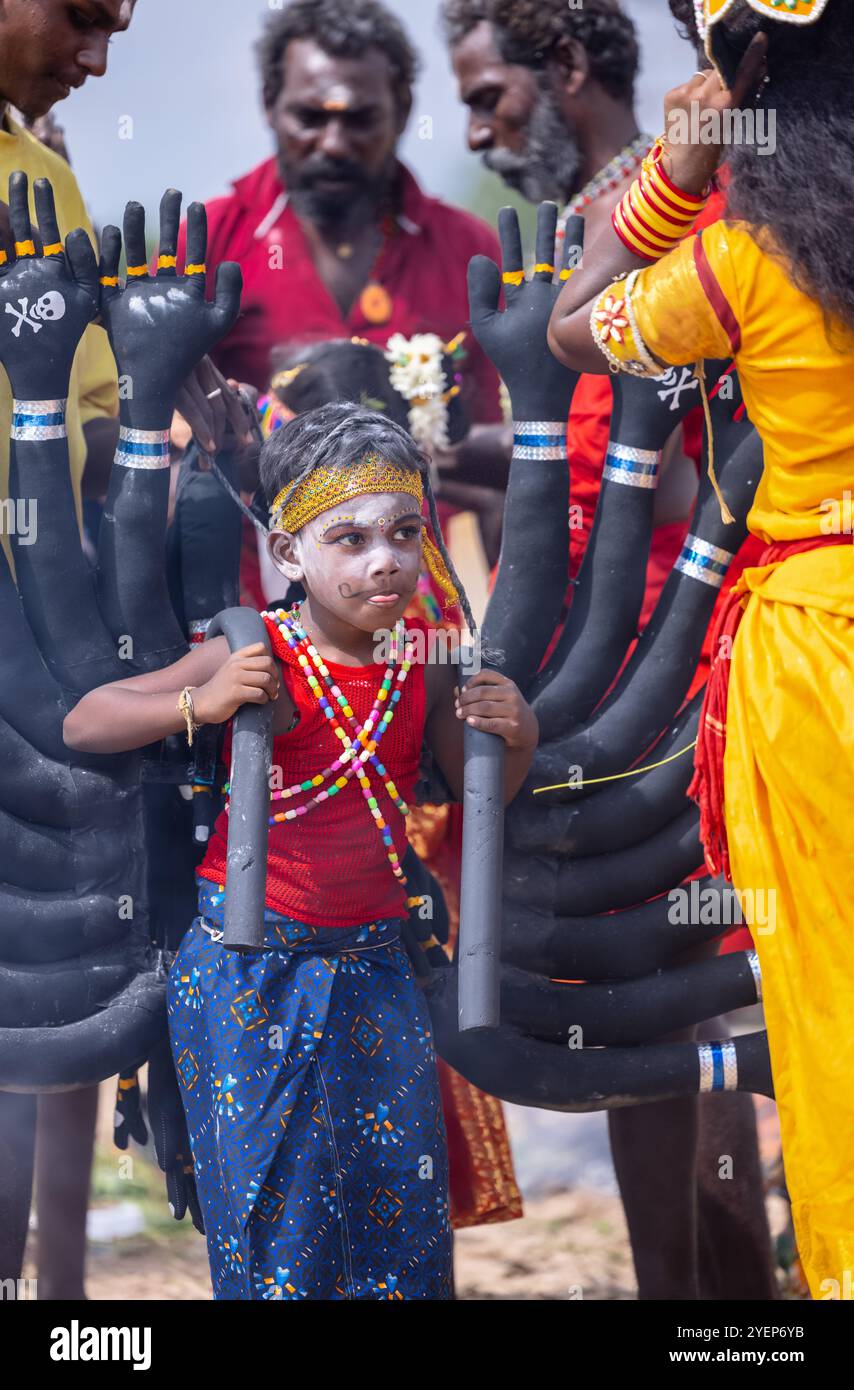Kulasai Dasara, Portrait of indian hindu devotee with painted face and ...