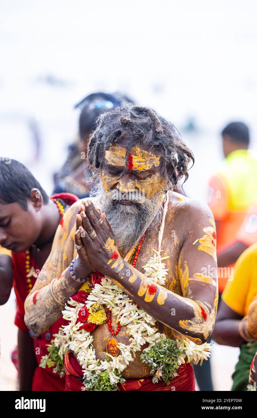 Kulasai Dasara, Portrait of indian hindu devotee with painted face and ...