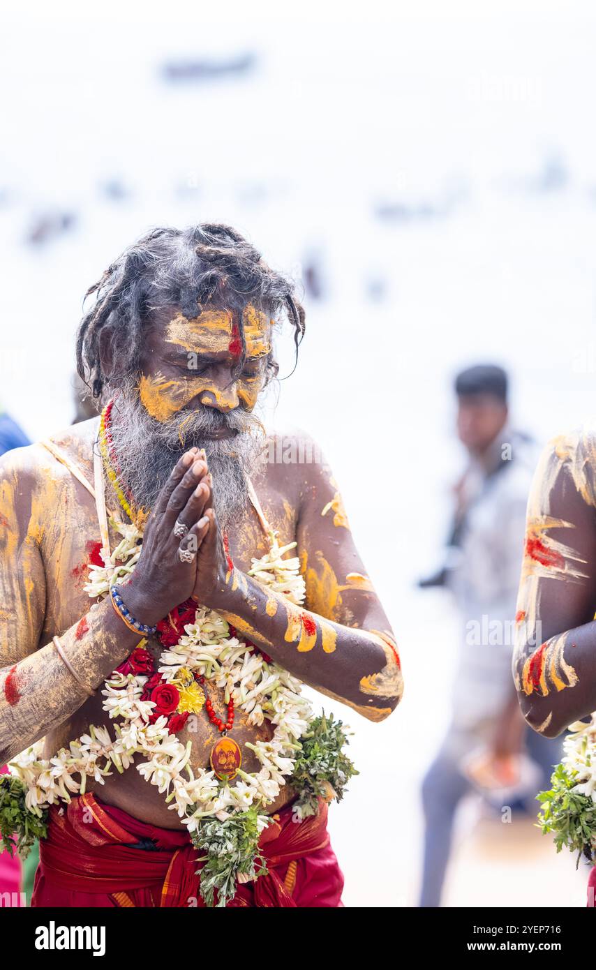 Kulasai Dasara, Portrait of indian hindu devotee with painted face and ...