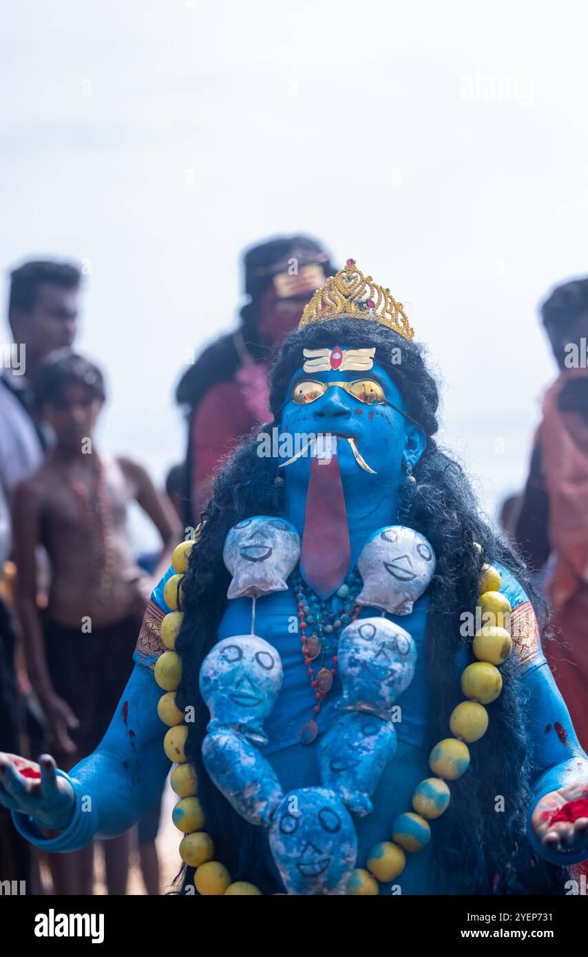 Kulasai Dasara, Portrait of indian hindu devotee with painted face and ...